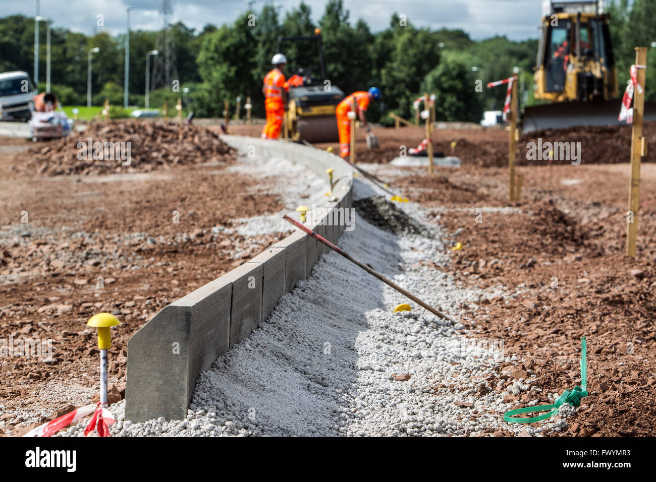Railway workers digging new railway track for Borders Railway Stock ...