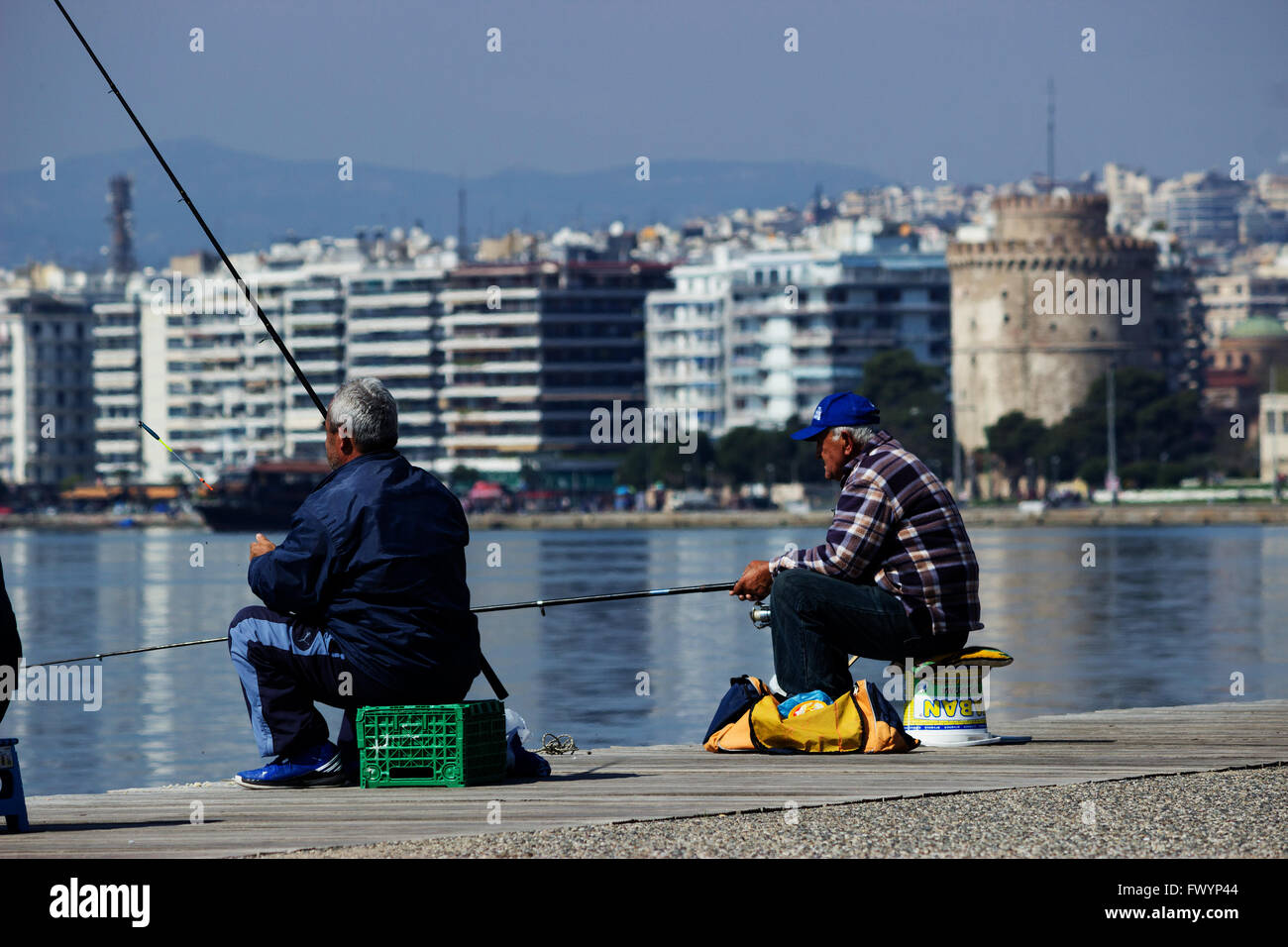 Angler hobbyists fishing in Thermaikos gulf, at the seafront of ...