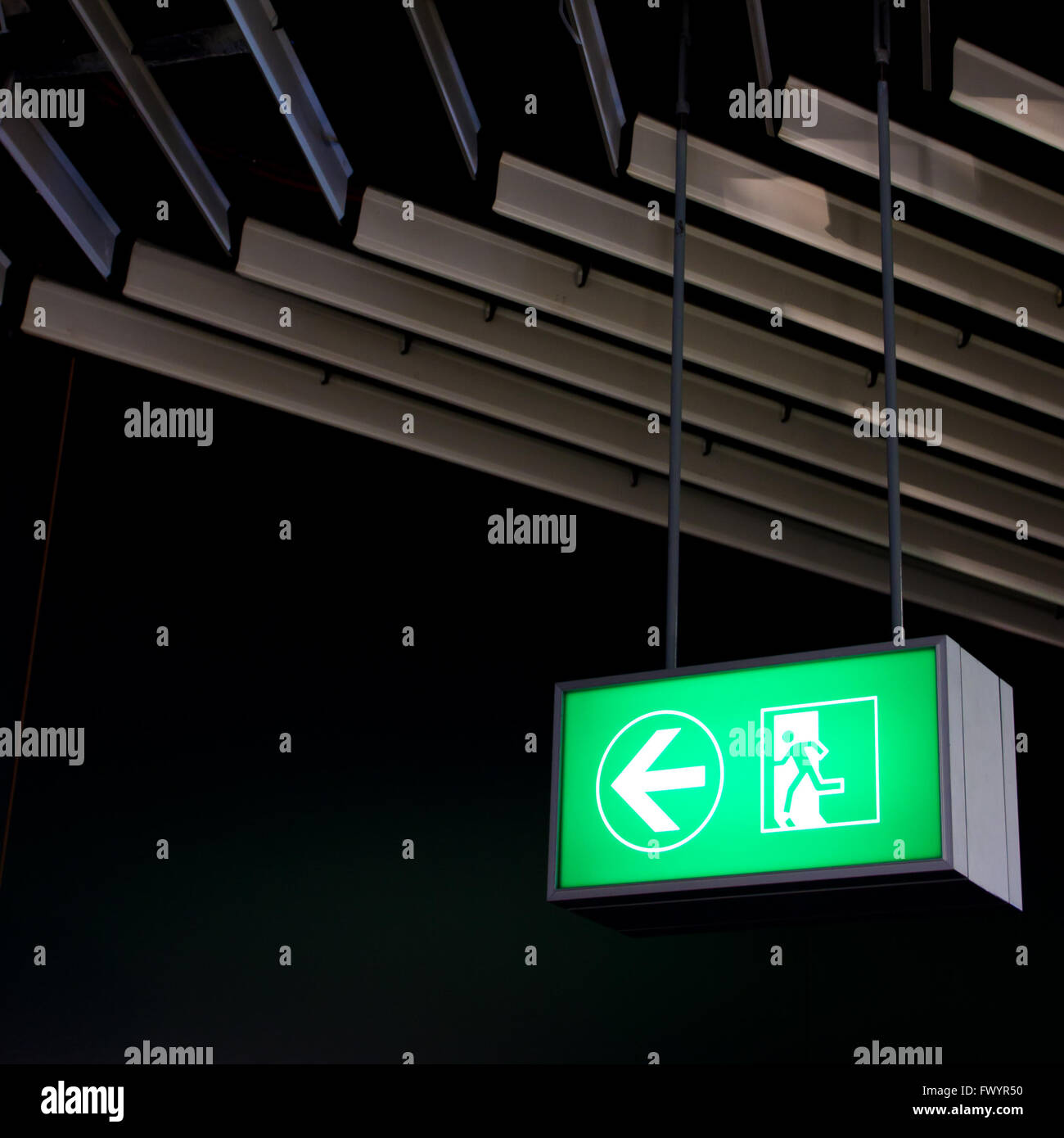 Emergency exit sign in modern offices inside an industrial plant Stock ...