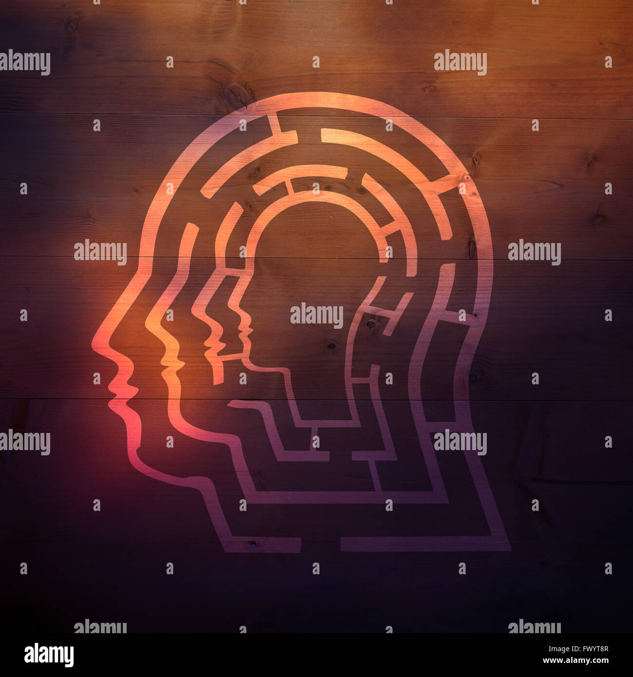 Composite image of maze brain in head Stock Photo - Alamy