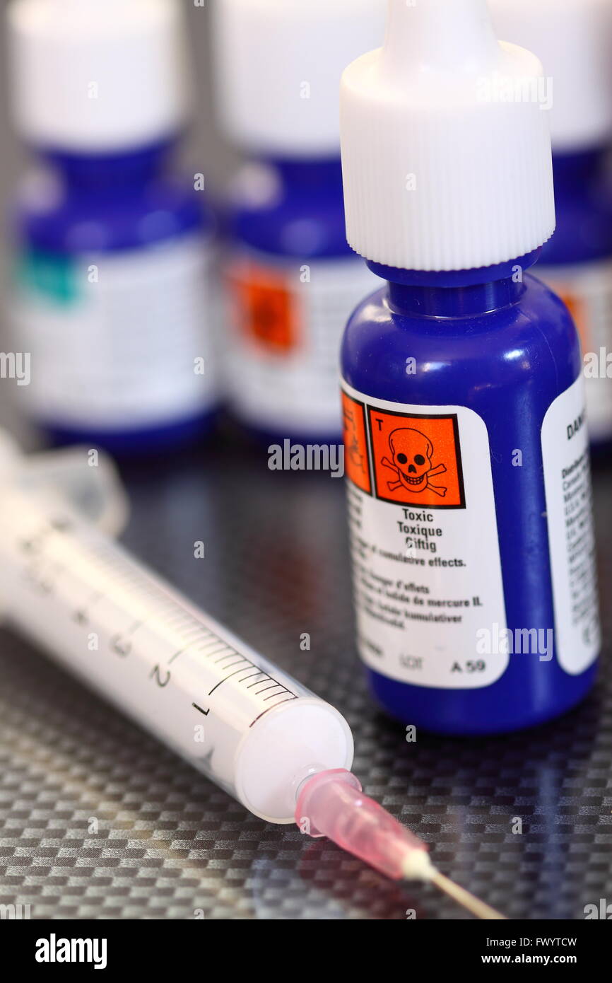 Chemical bottle hazardous syringe Stock Photo - Alamy