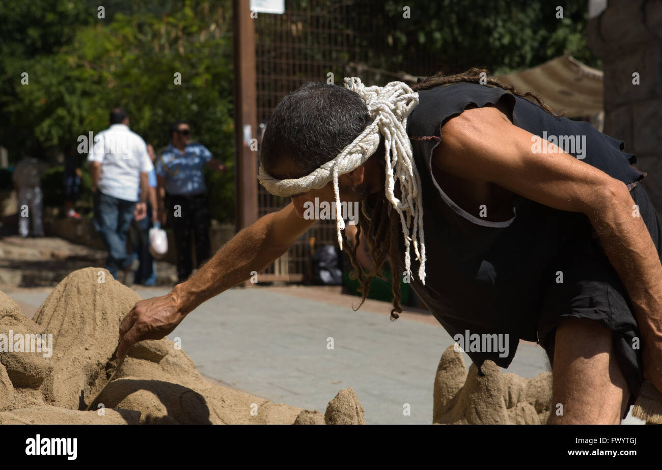 Man sand sculpturing hi-res stock photography and images - Alamy