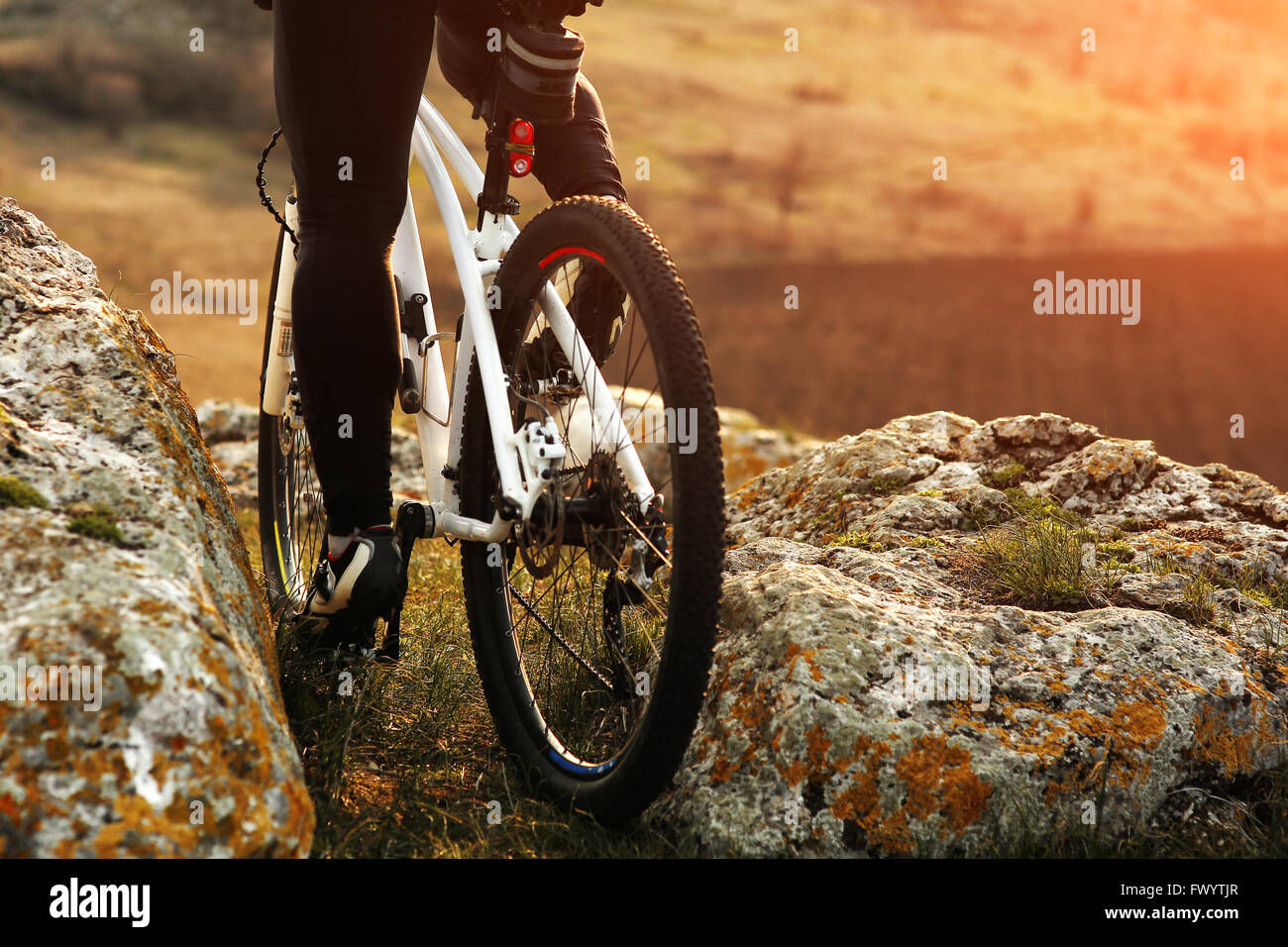 Man cyclist riding the bicycle Stock Photo - Alamy