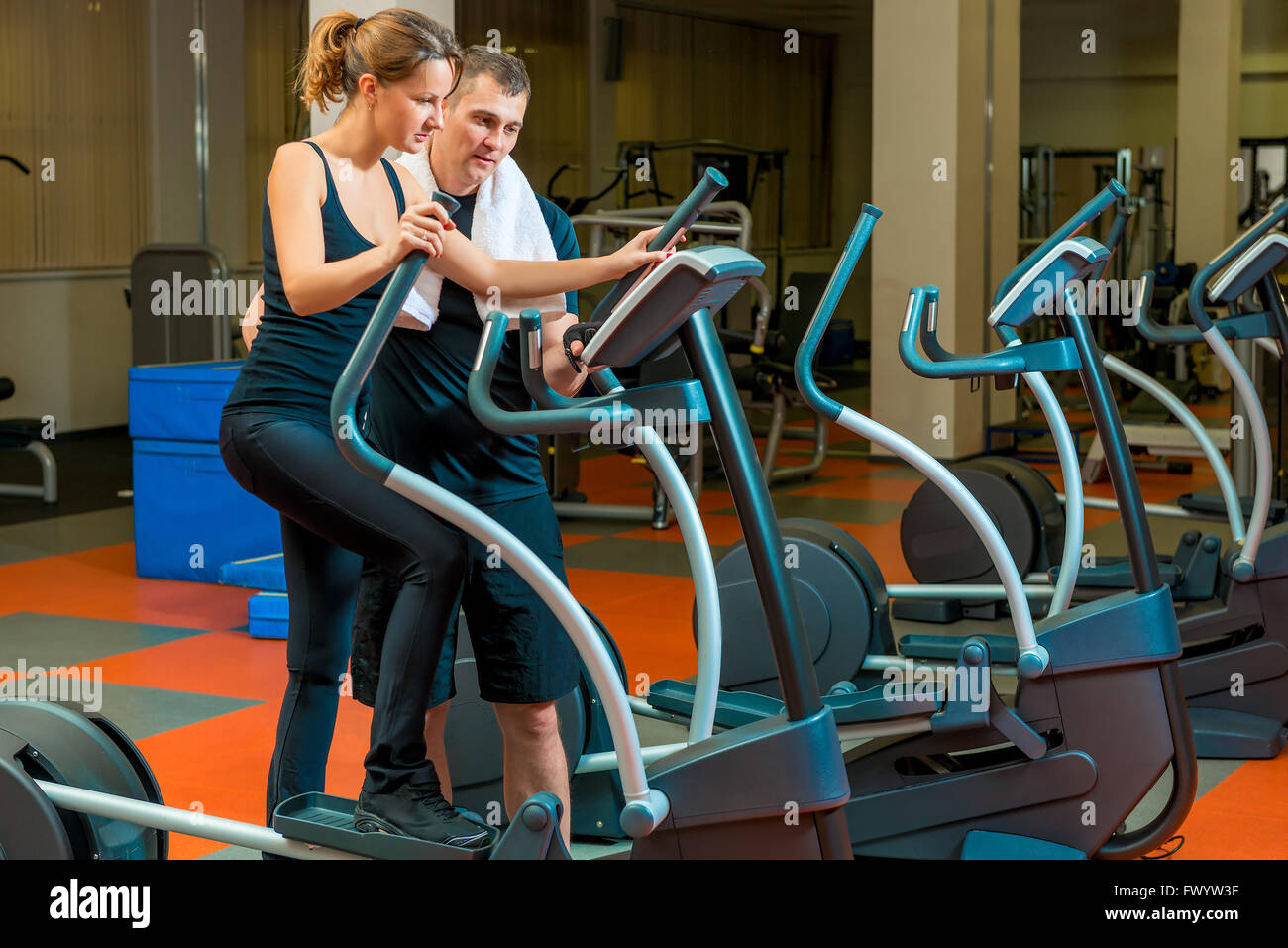 coach teaches an athlete in training in the gym Stock Photo - Alamy