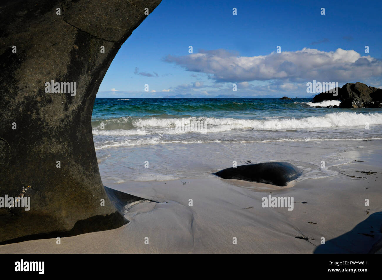 Rock formations on the sandy beach near Hov on island Gimsøy on Lofoten ...