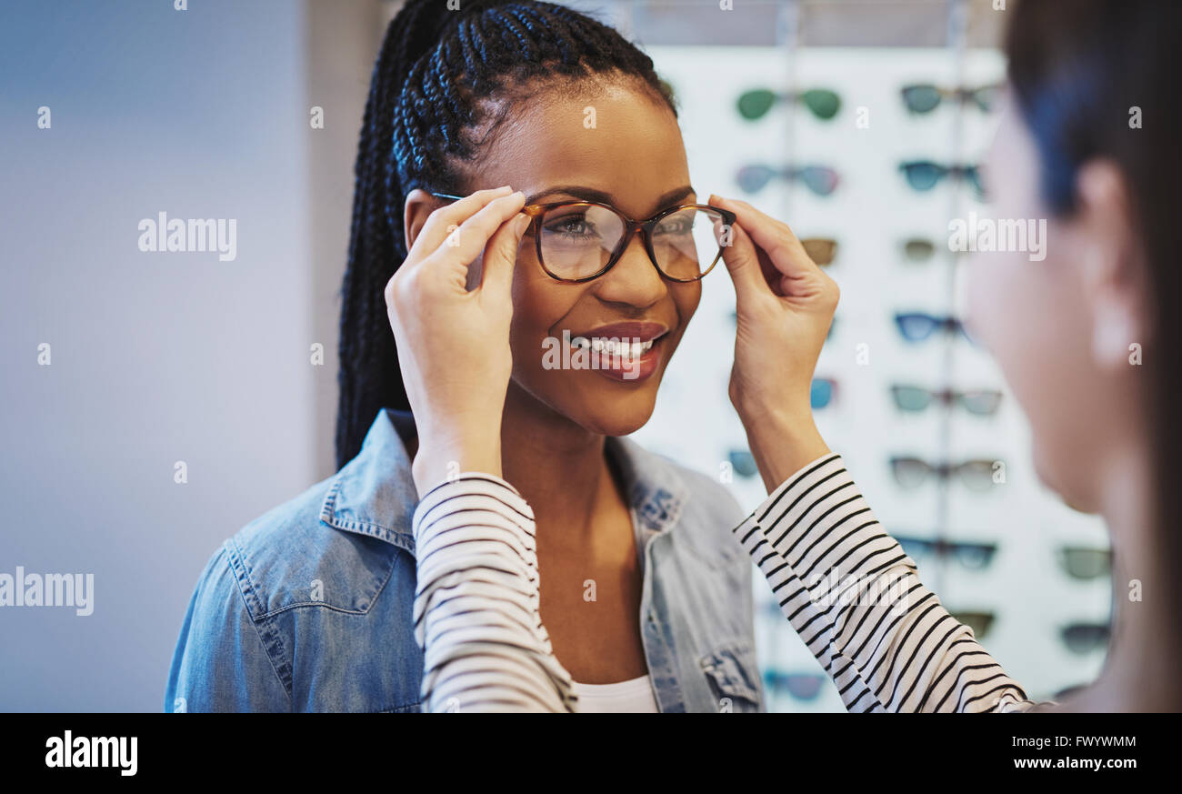 Trying on glasses optician hi-res stock photography and images - Alamy