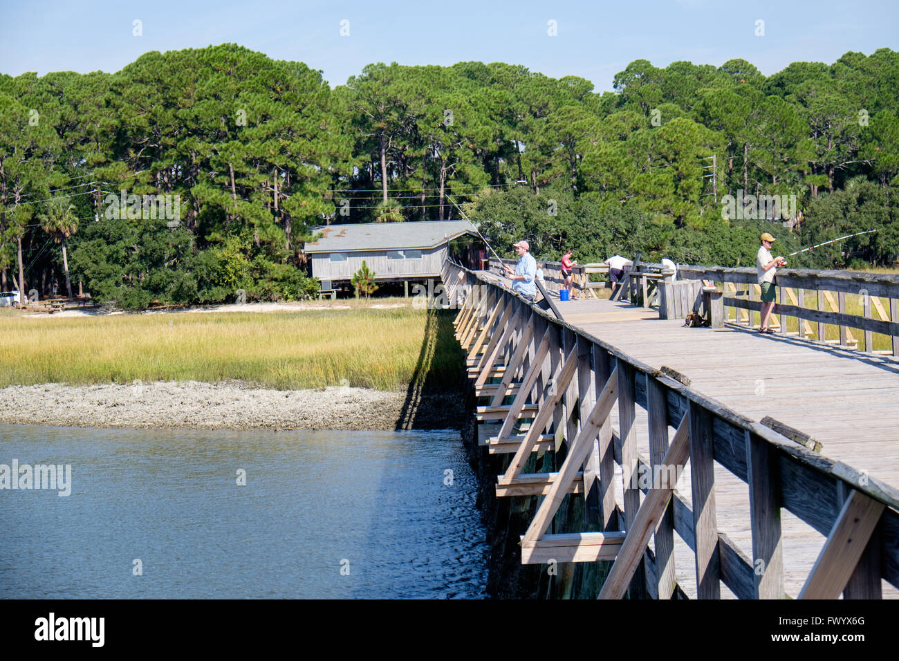 Fishing pier at Fripp inlet on Hunting Island State Park, South ...