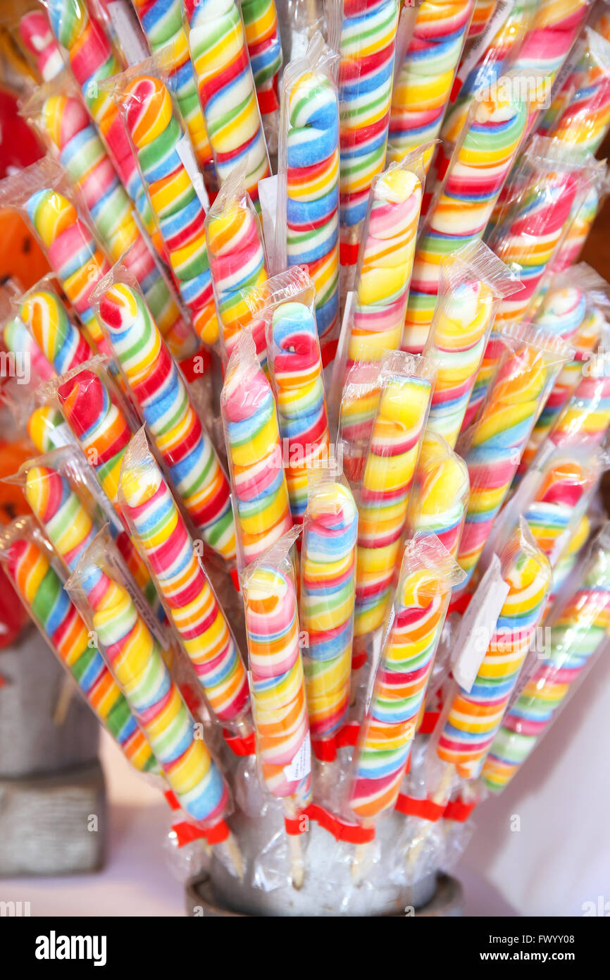 Sweet colorful lollipops on street market as a background Stock Photo ...