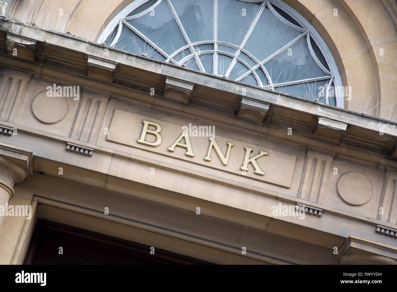 Bank Sign above Building Entrance Stock Photo - Alamy