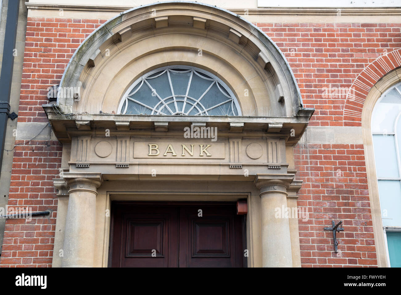 Bank Sign above Building Entrance Stock Photo - Alamy