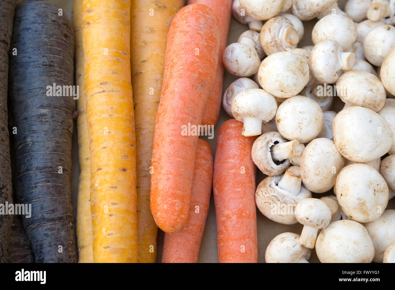 Carrot and Mushroom Vegetables in Basket on Market Stall Stock Photo ...