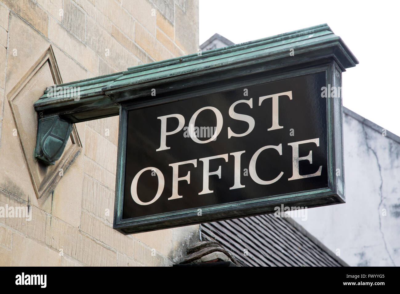 Post Office Sign on Stone Facade Stock Photo - Alamy