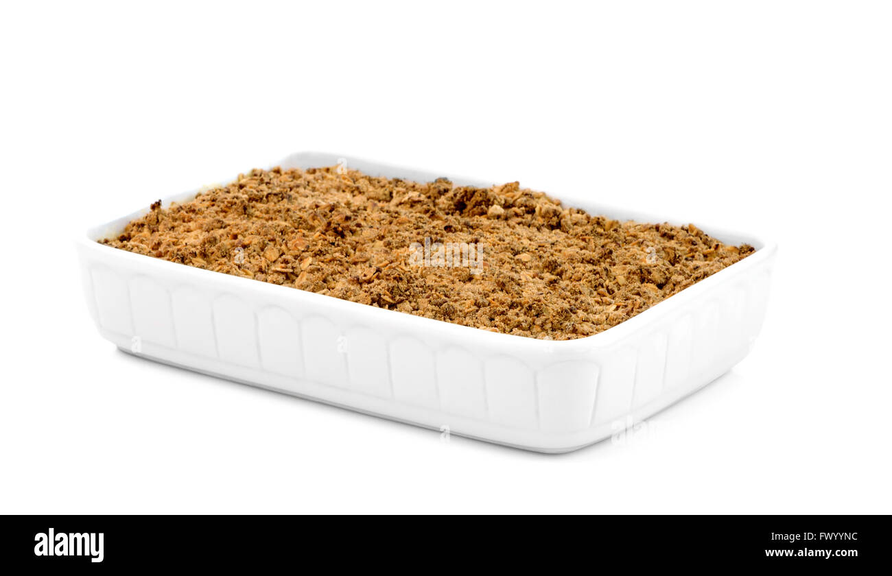 Apple crumble in a white ceramic pan isolated on white background Stock ...