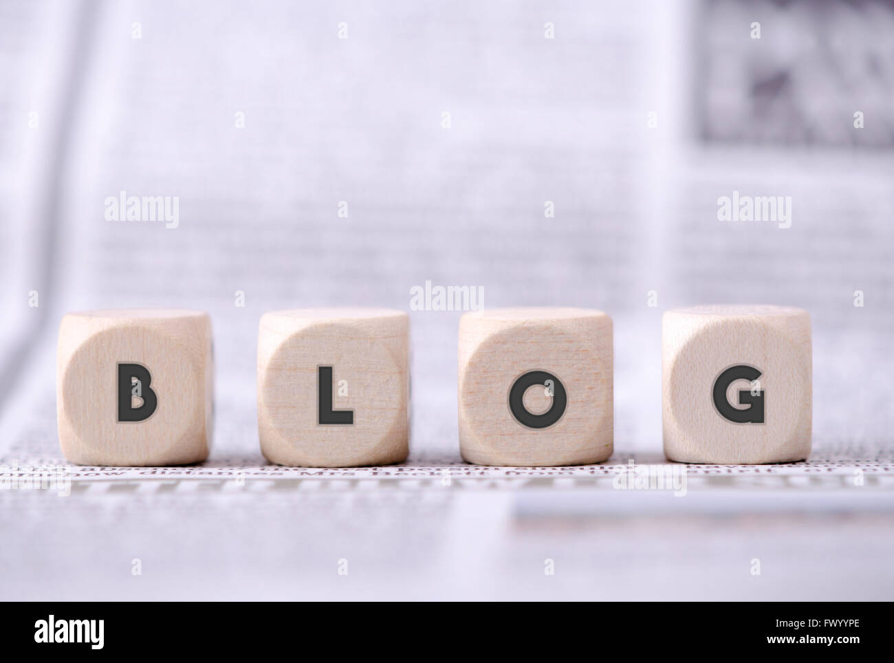 Four wooden dice with blog word as a business concept Stock Photo - Alamy