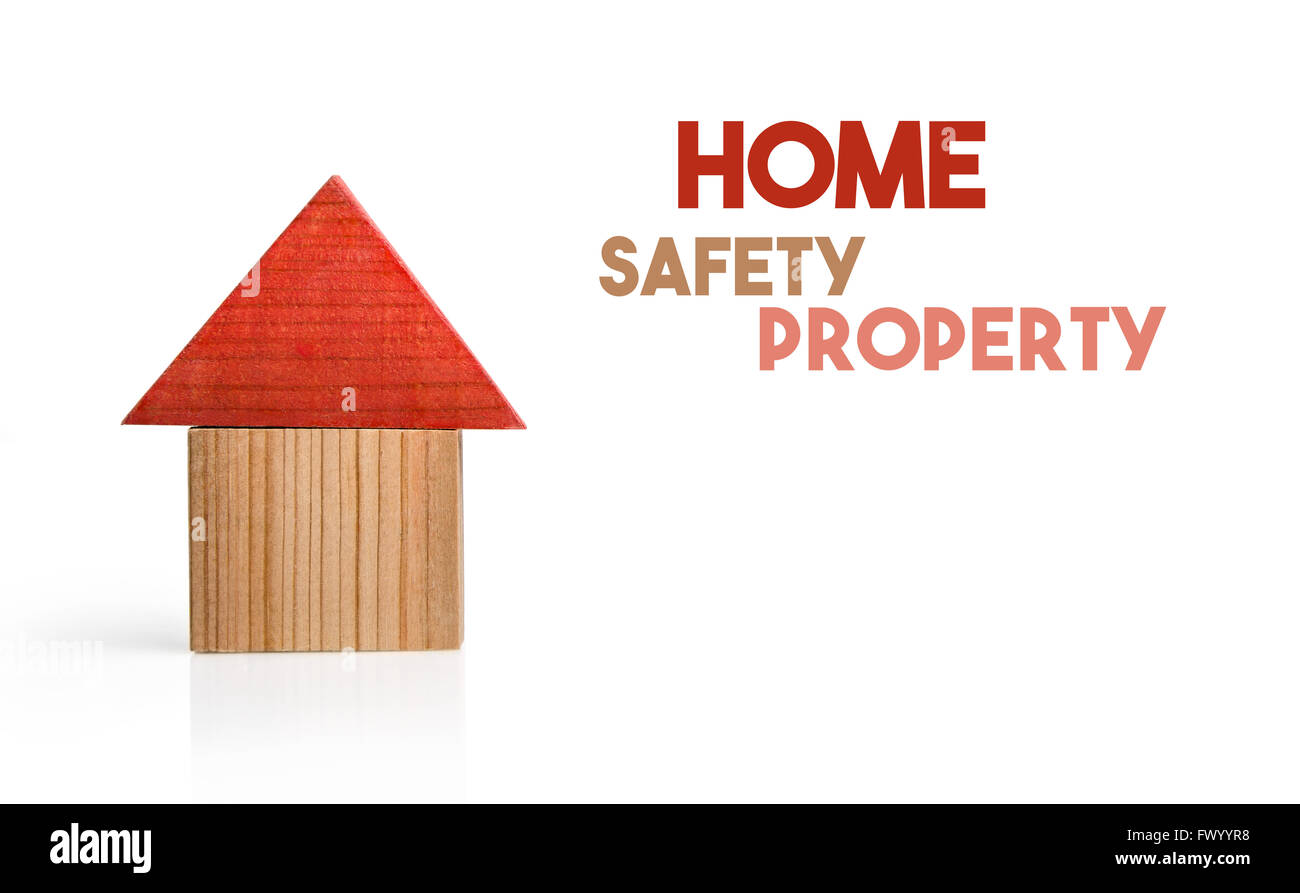 Wooden house model as a symbol of safety living Stock Photo - Alamy