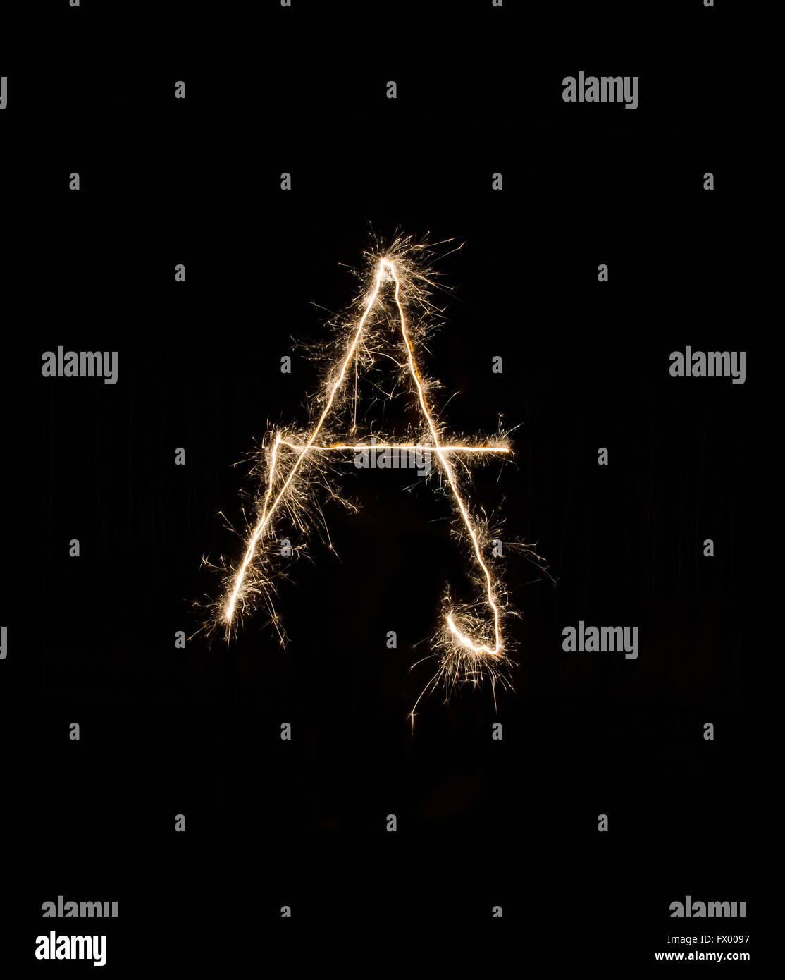 Letter A drew with spakrs on a black background Stock Photo - Alamy