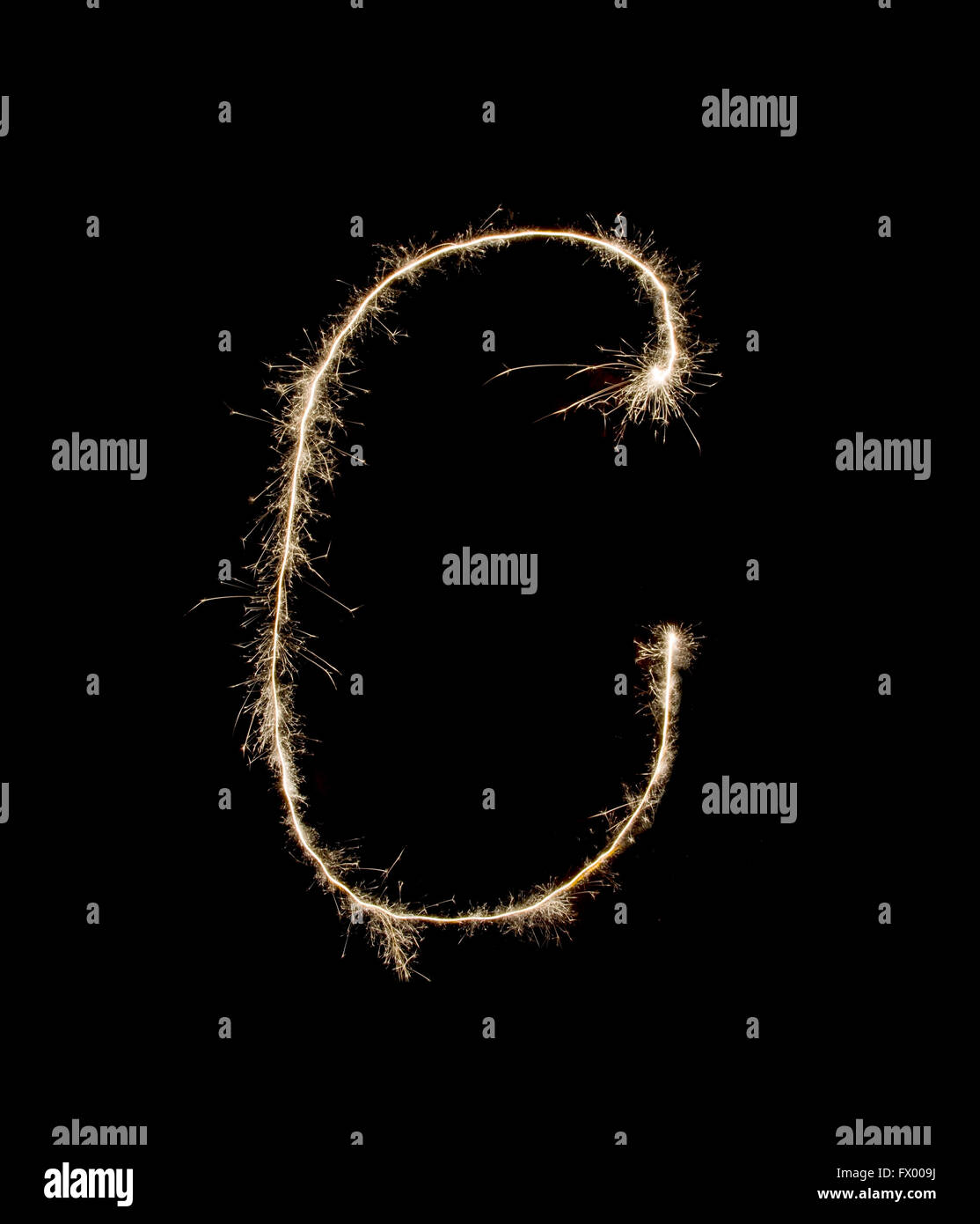 Letter C drew with spakrs on a black background Stock Photo - Alamy