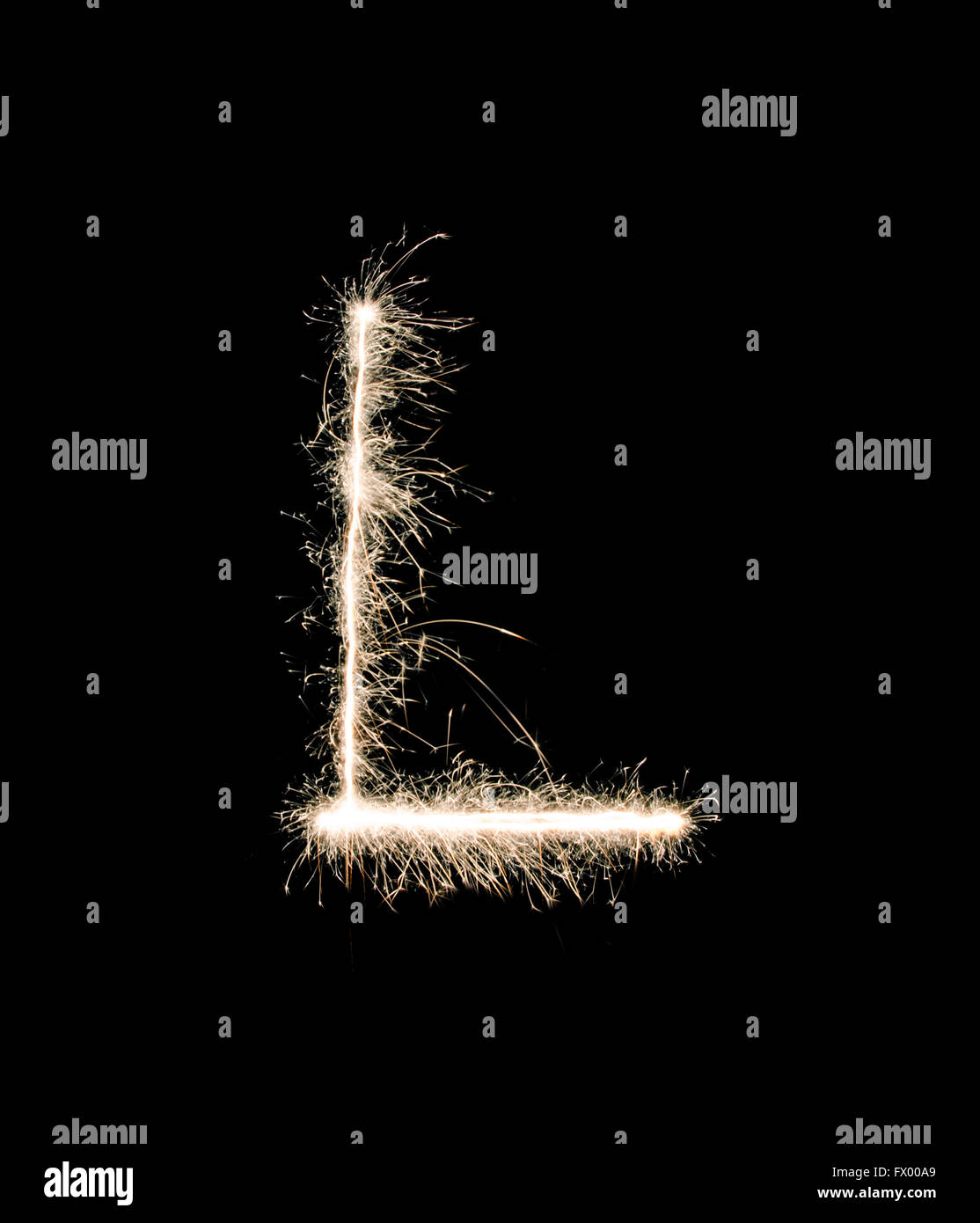 Letter L drew with spakrs on a black background Stock Photo - Alamy