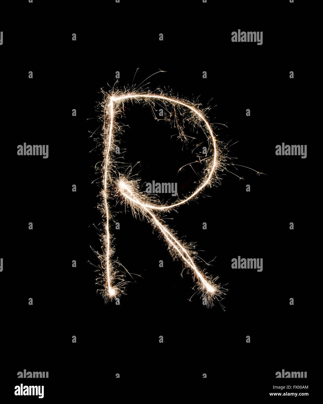 Letter R drew with spakrs on a black background Stock Photo - Alamy