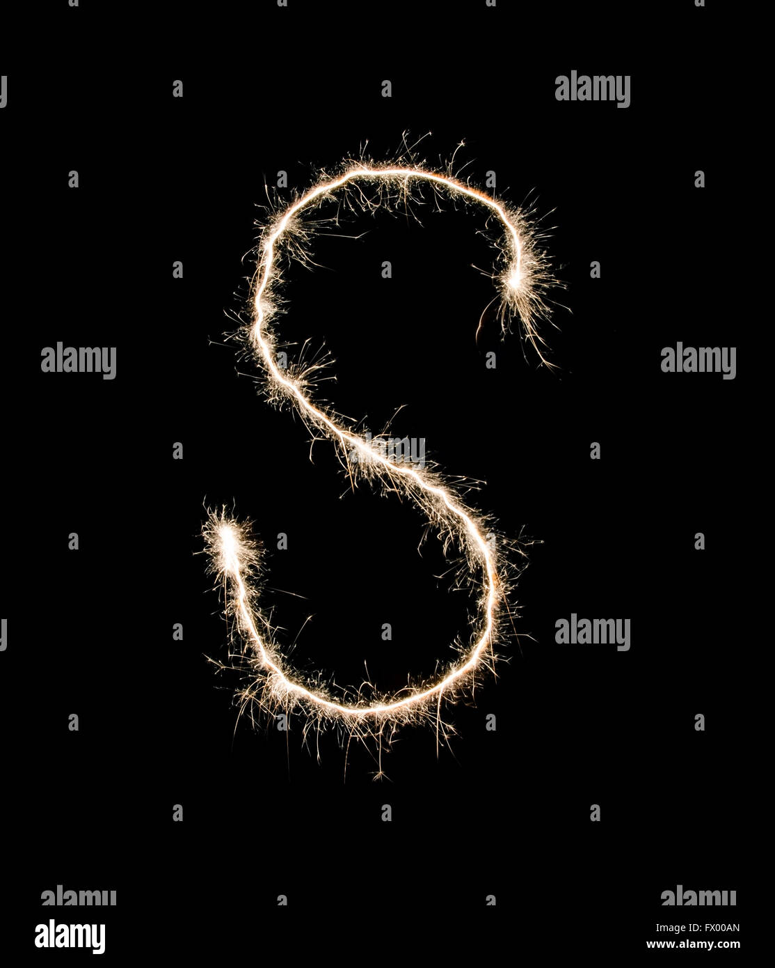 Letter S drew with spakrs on a black background Stock Photo - Alamy