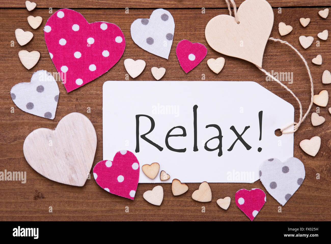 Label With Pink Heart, Text Relax Stock Photo - Alamy