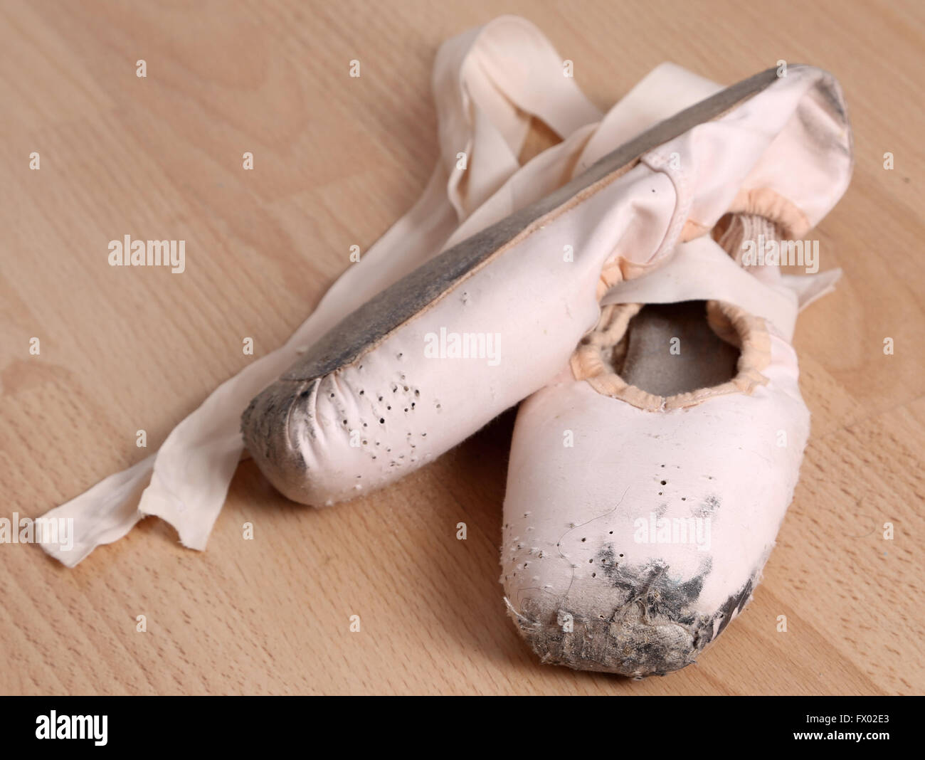 A very old, well worn, much loved and moth eaten ballet pointe shoes ...