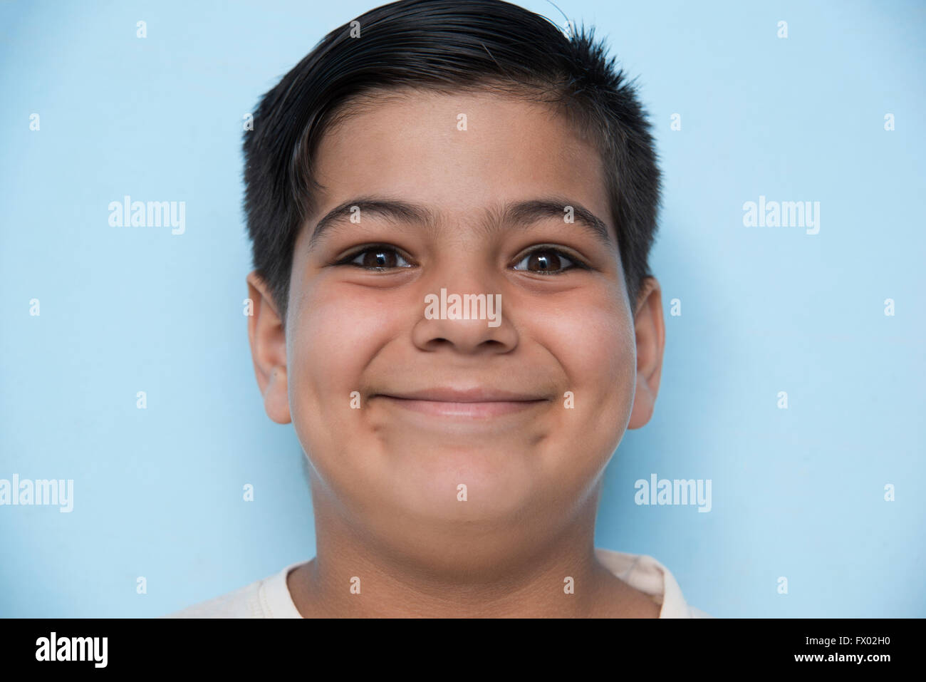Portrait of teenage Latin boy Stock Photo - Alamy