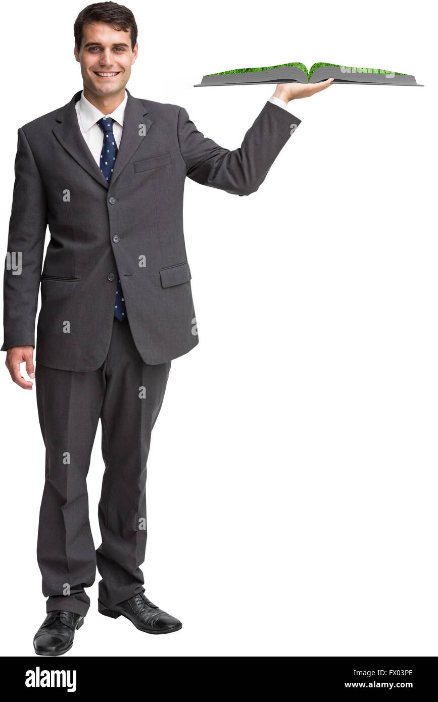 Man holding up lawn book Stock Photo - Alamy