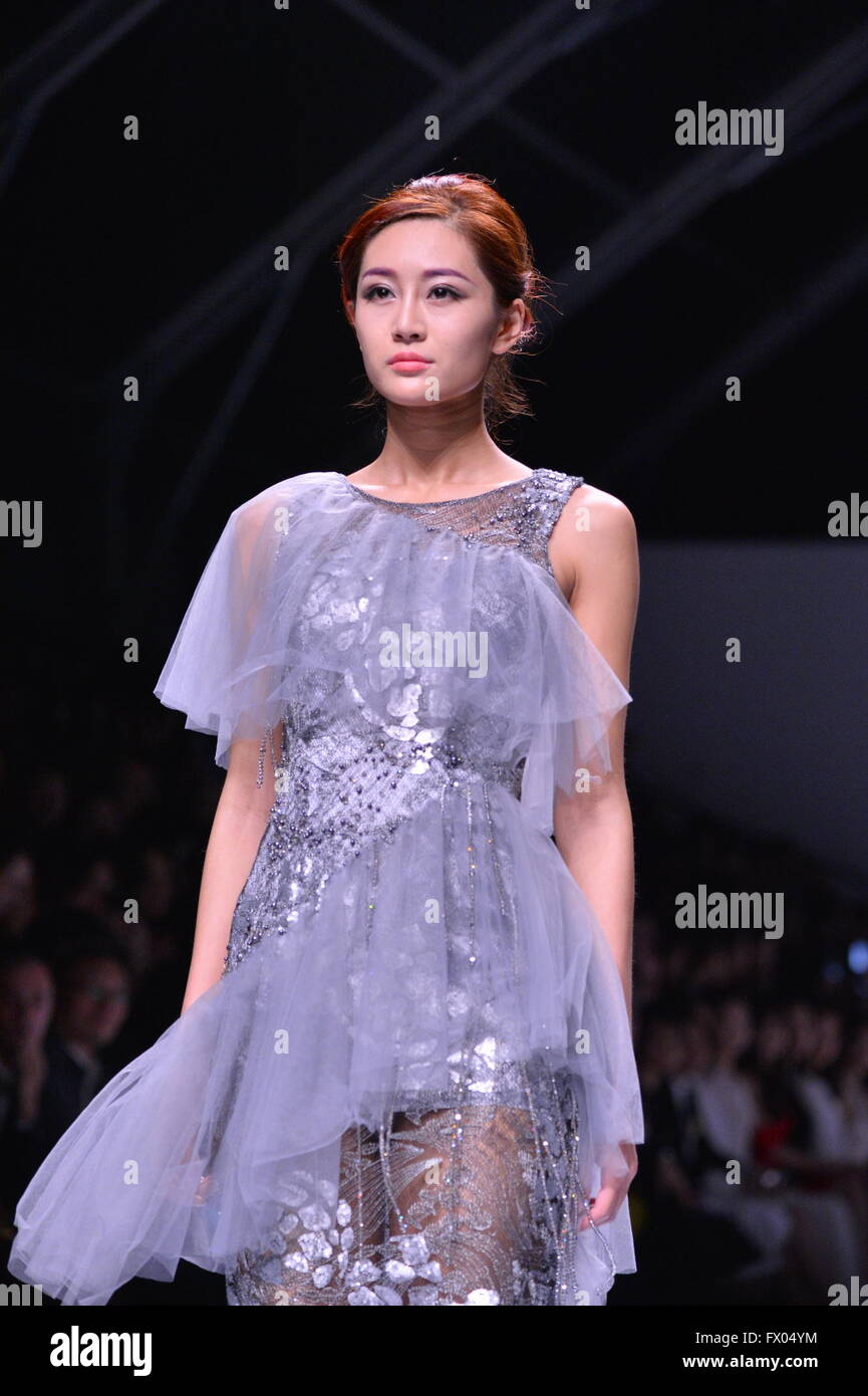 Shanghai, China. 8th Apr, 2016. A model presents a creation by designer Lan Yu during the ...