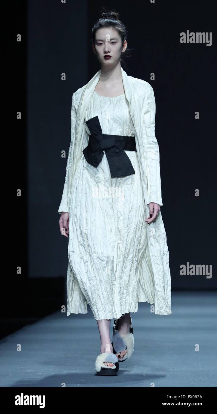 Shanghai, China. 8th Apr, 2016. A model presents a creation designed by ...