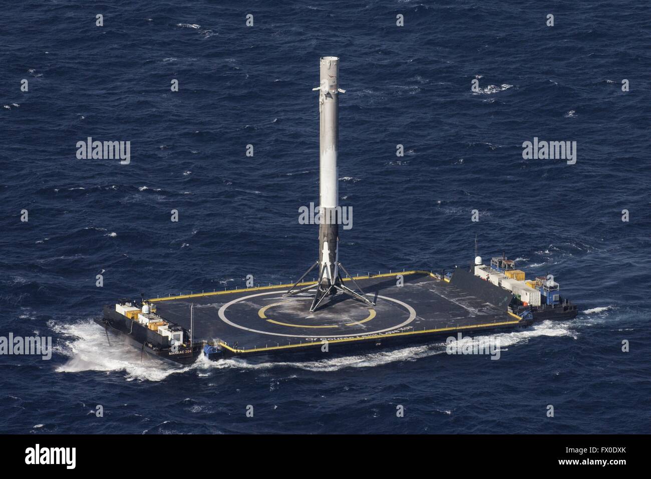 The SpaceX Falcon 9 reusable rocket in perfect position after landing ...