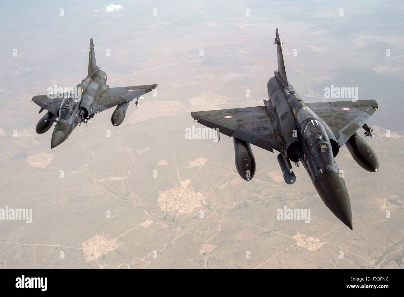 French Air Force Mirage 2000D fighter aircraft fly in formation as they ...
