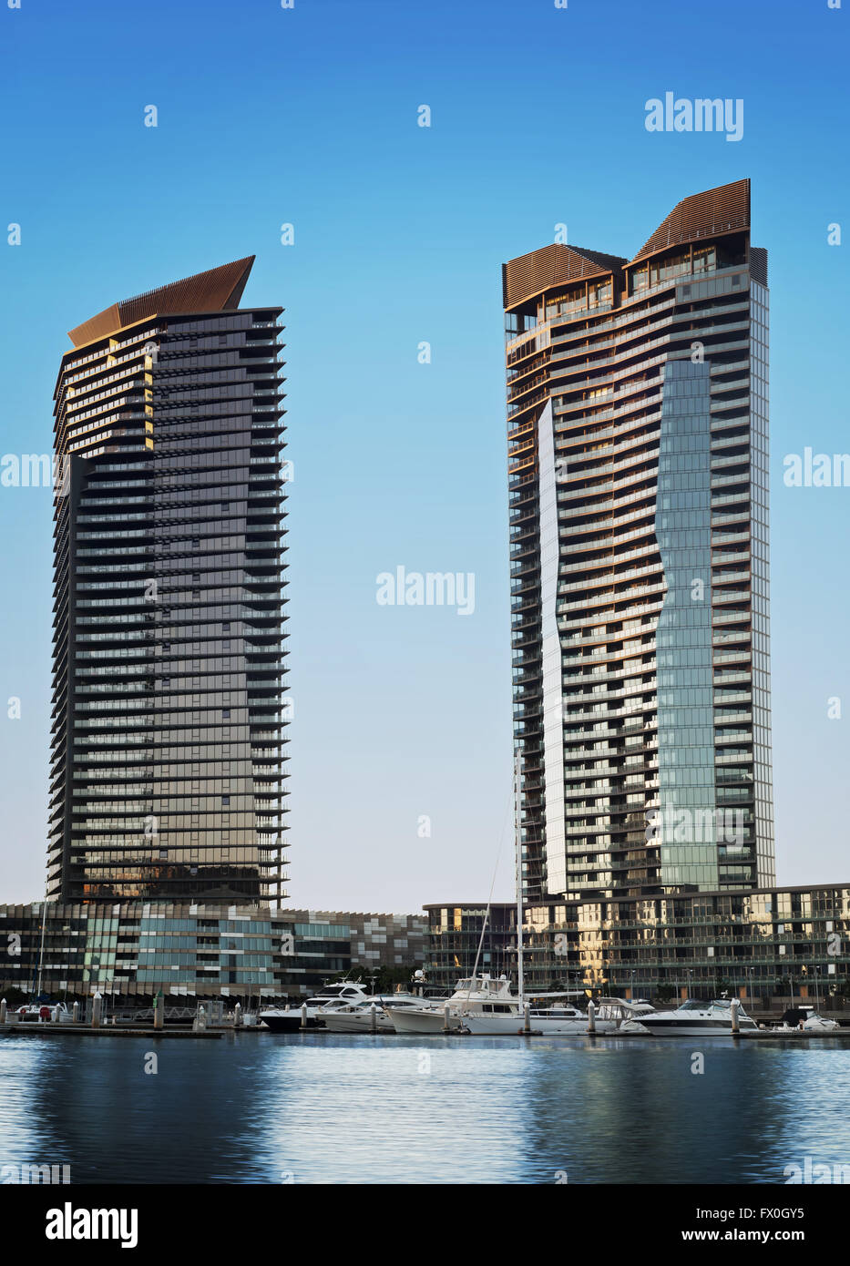 A photo of high waterfront buildings and boats in Docklands early ...
