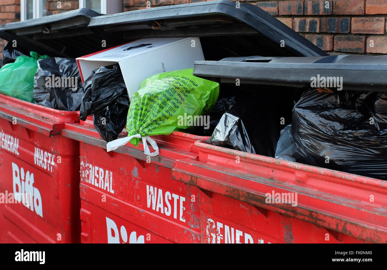 Waste material skips over full Stock Photo - Alamy