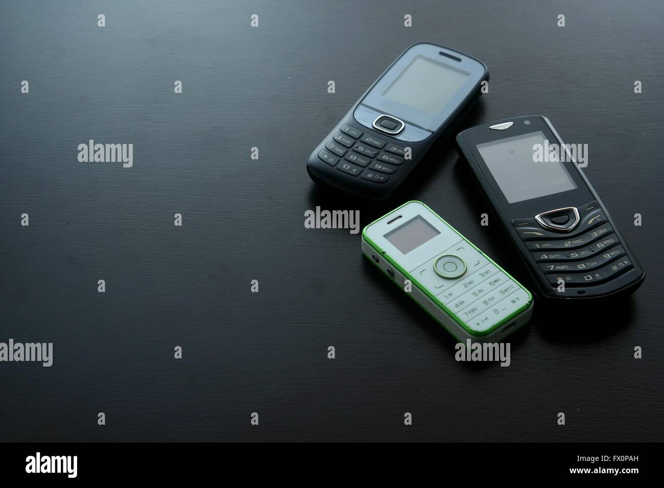 Retro cellphones hi-res stock photography and images - Alamy