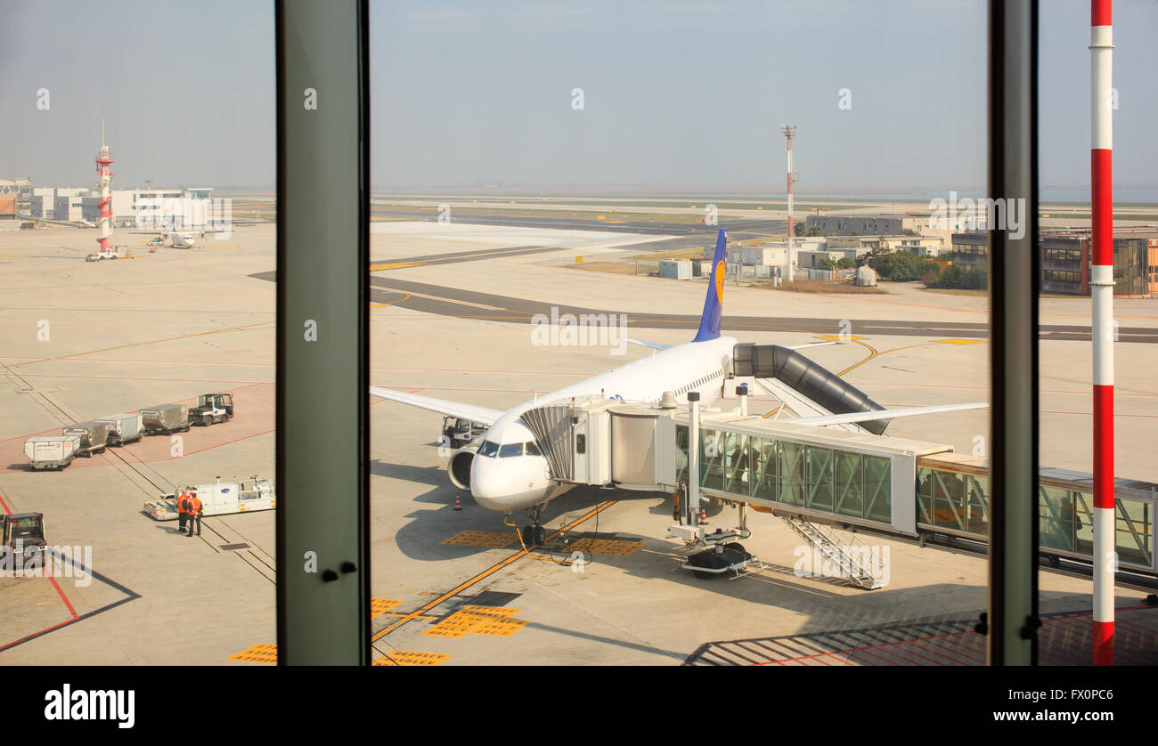 View of airplane with passenger stairs Stock Photo - Alamy