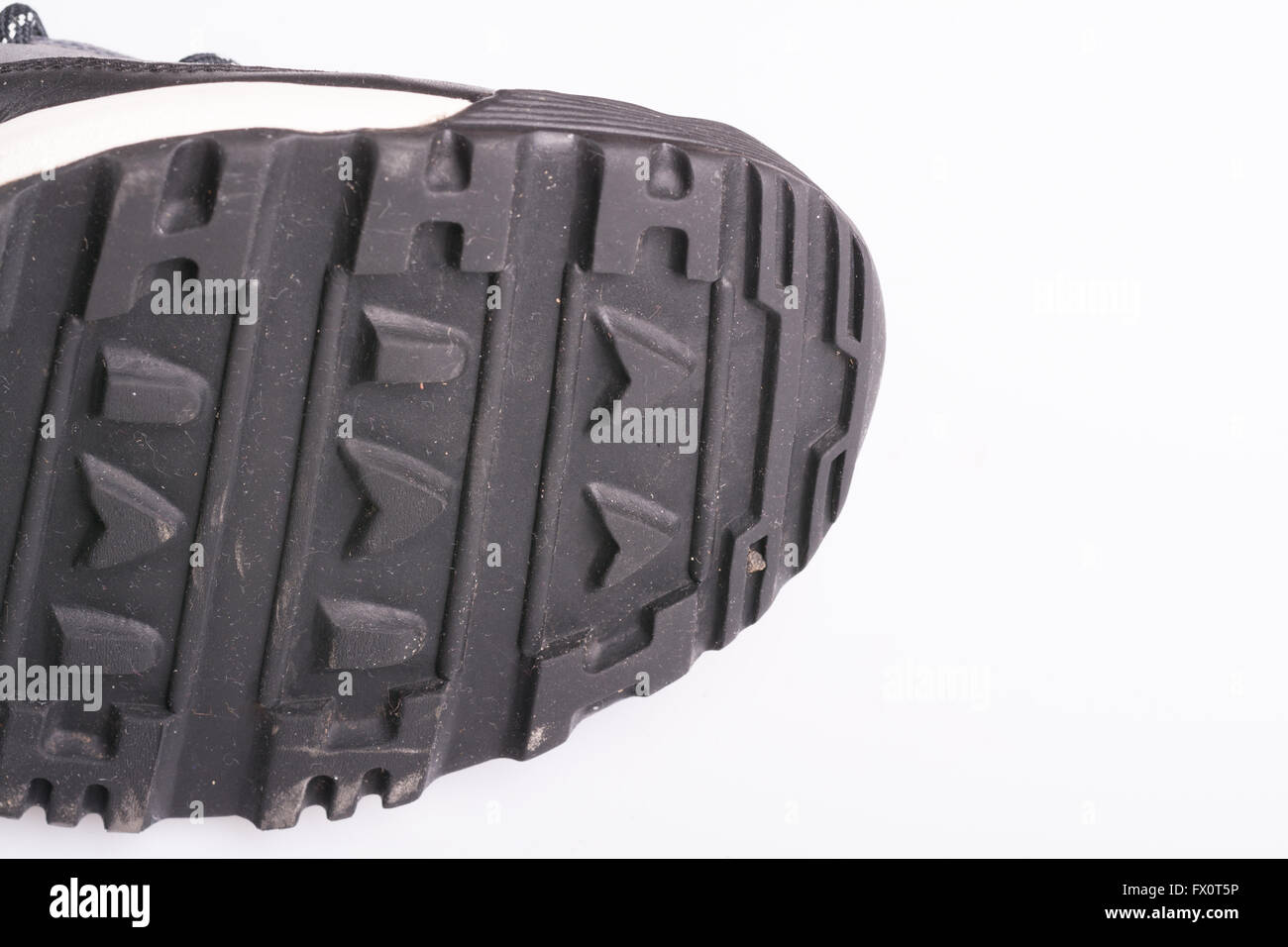 Old soles of shoes used for training on a white background Stock Photo ...
