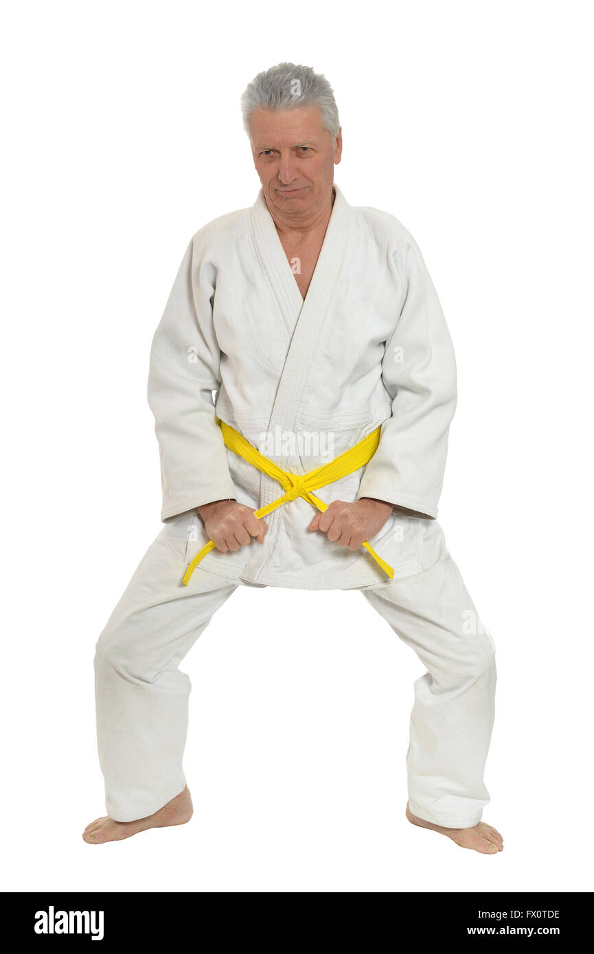 Senior man in karate pose Stock Photo - Alamy