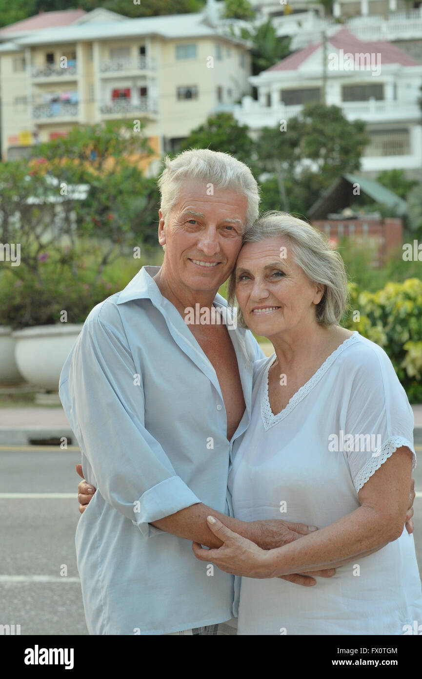 elderly couple rest at tropical resort Stock Photo - Alamy