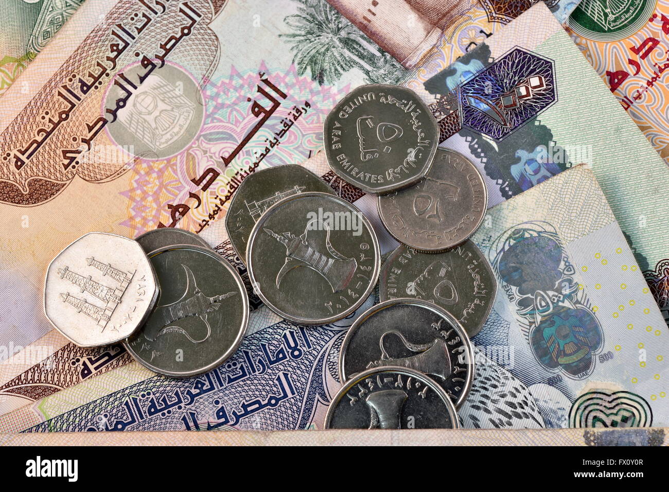 Close up different Dirhams currency note and coins, United Arab ...