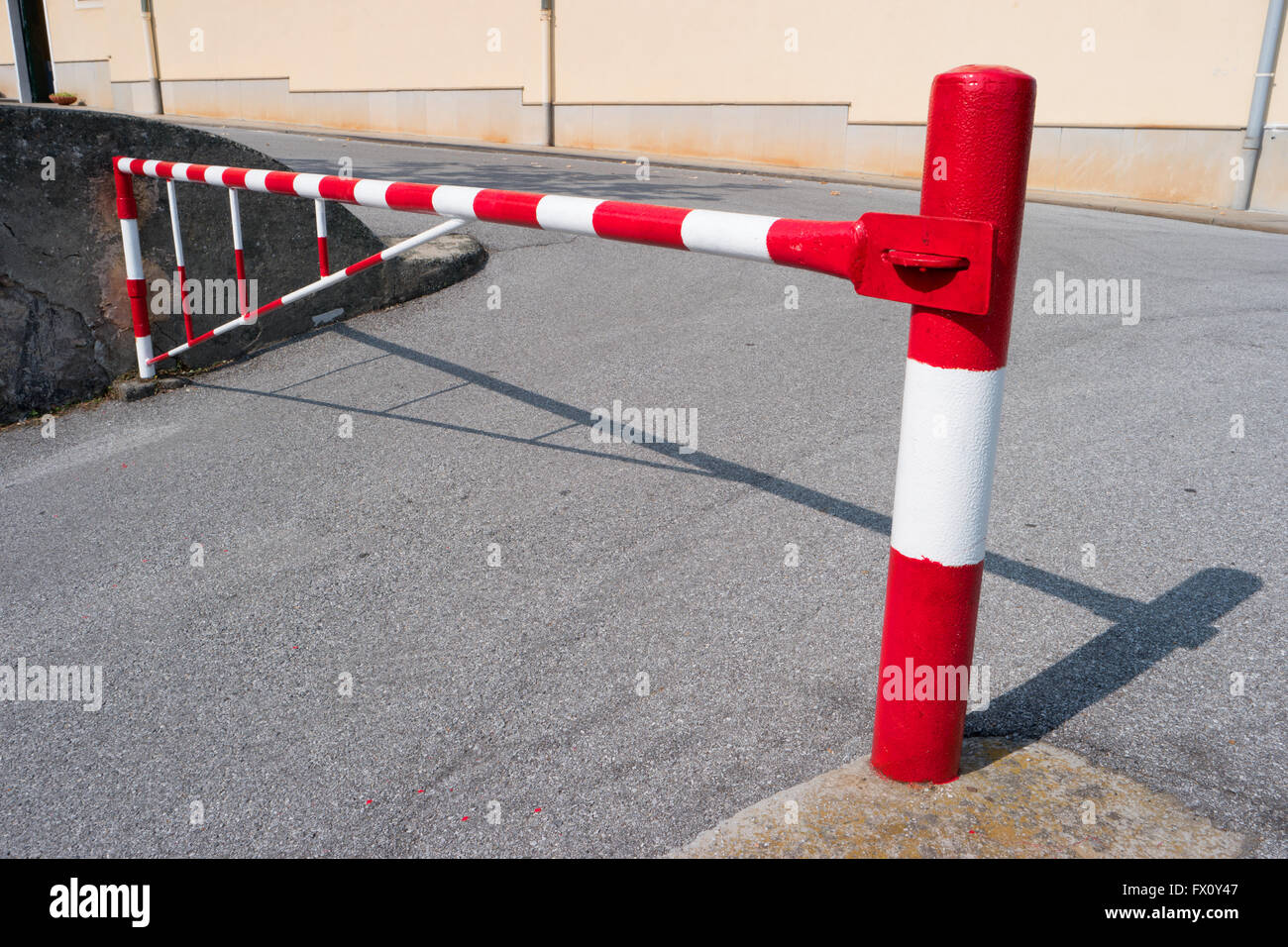 Iron barrier with opening manual movement Stock Photo - Alamy