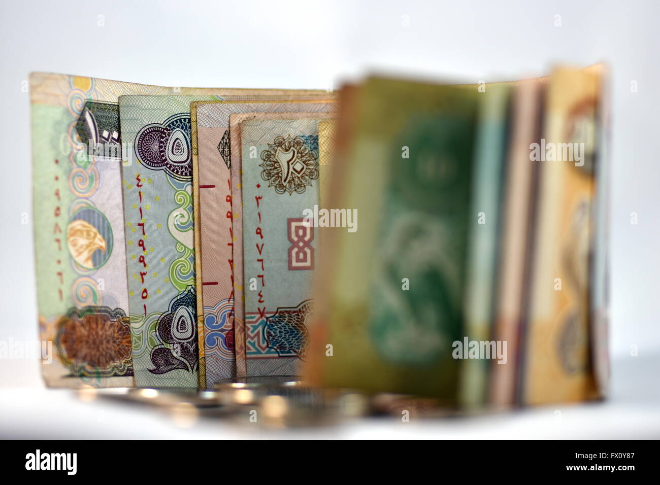 Close up different Dirhams currency note and coins, United Arab ...
