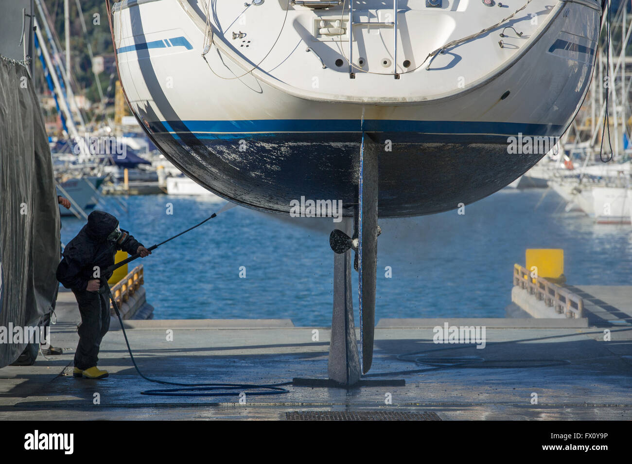 maintenance boat with high pressure water Stock Photo - Alamy