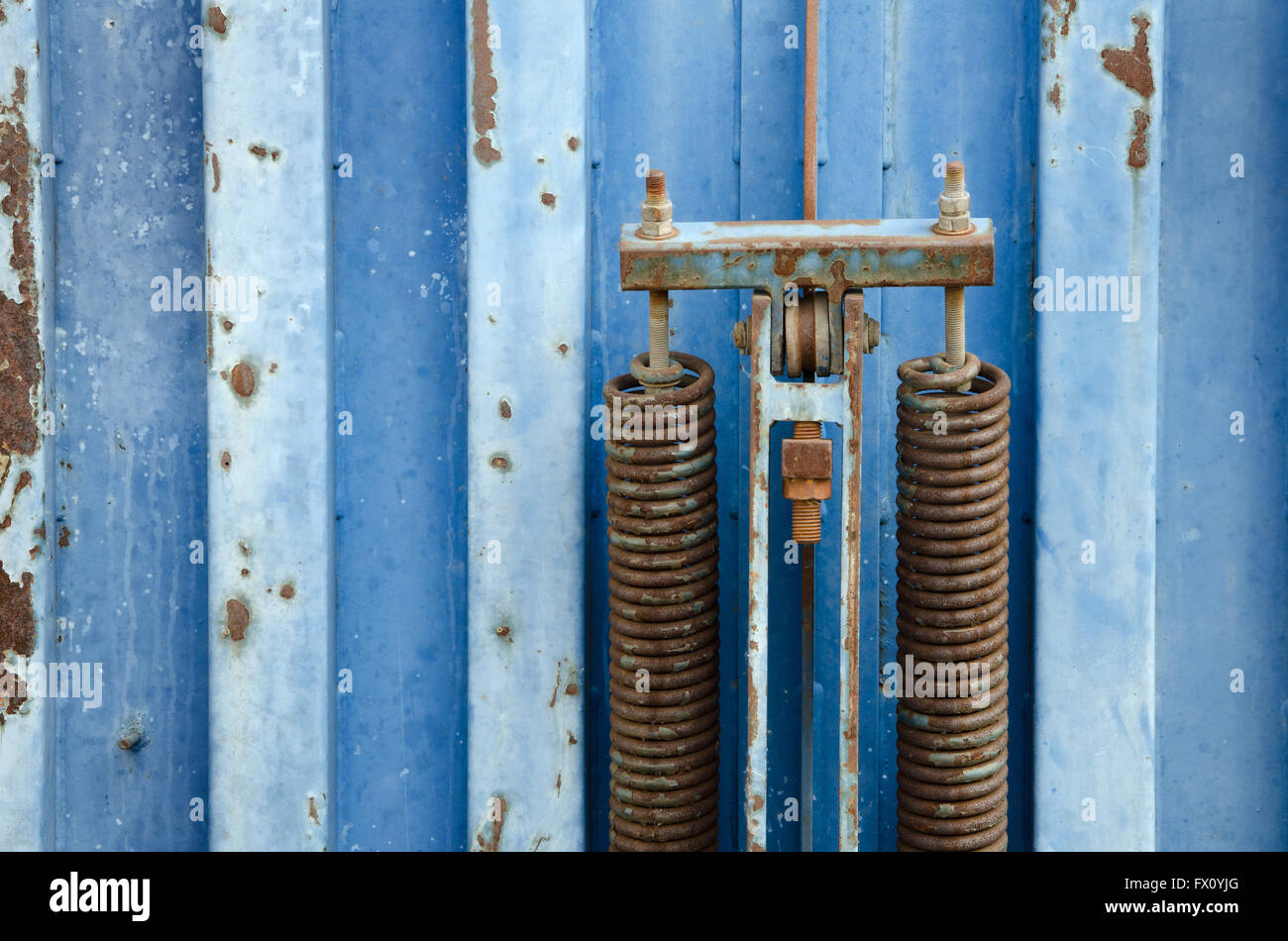 Detail of old blue rusty metal container Stock Photo - Alamy