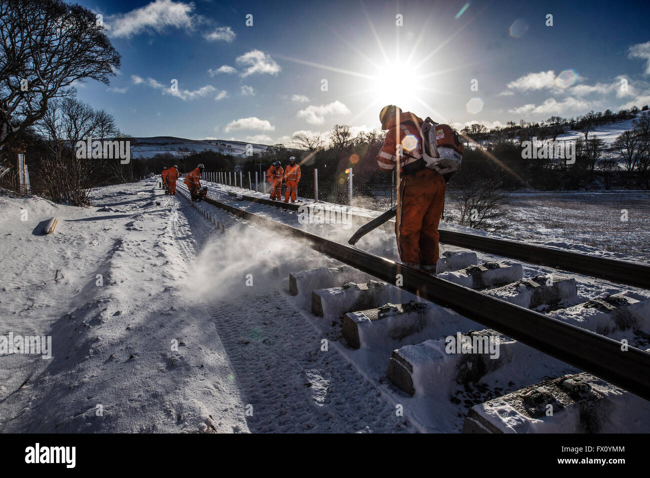 Snow getting blown off line during Borders Railway Construction Stock ...