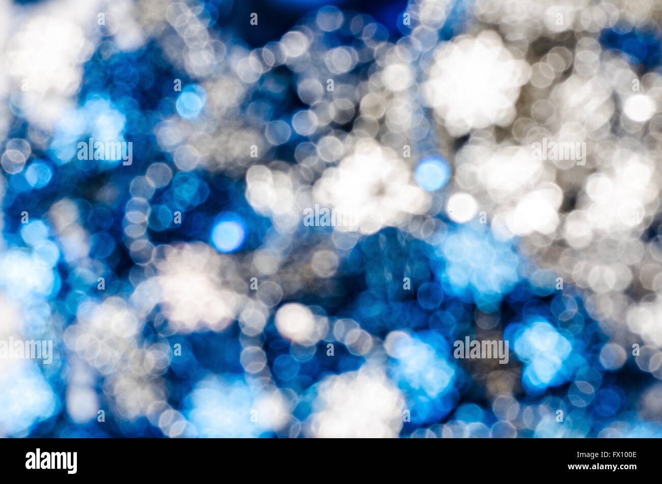 Blue silver blur circle lights as background Stock Photo - Alamy