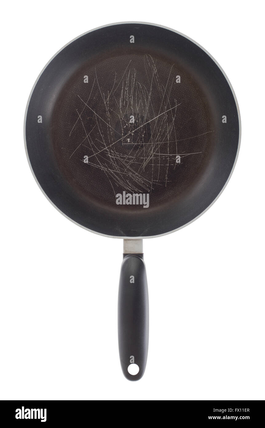 Broken old frying pan isolated on a white background Stock Photo - Alamy