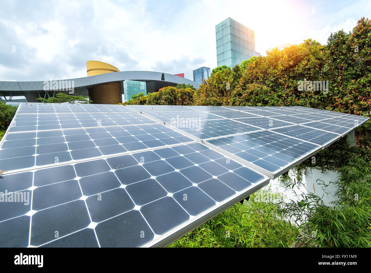 Solar Panels In The Park Of Modern City Stock Photo - Alamy