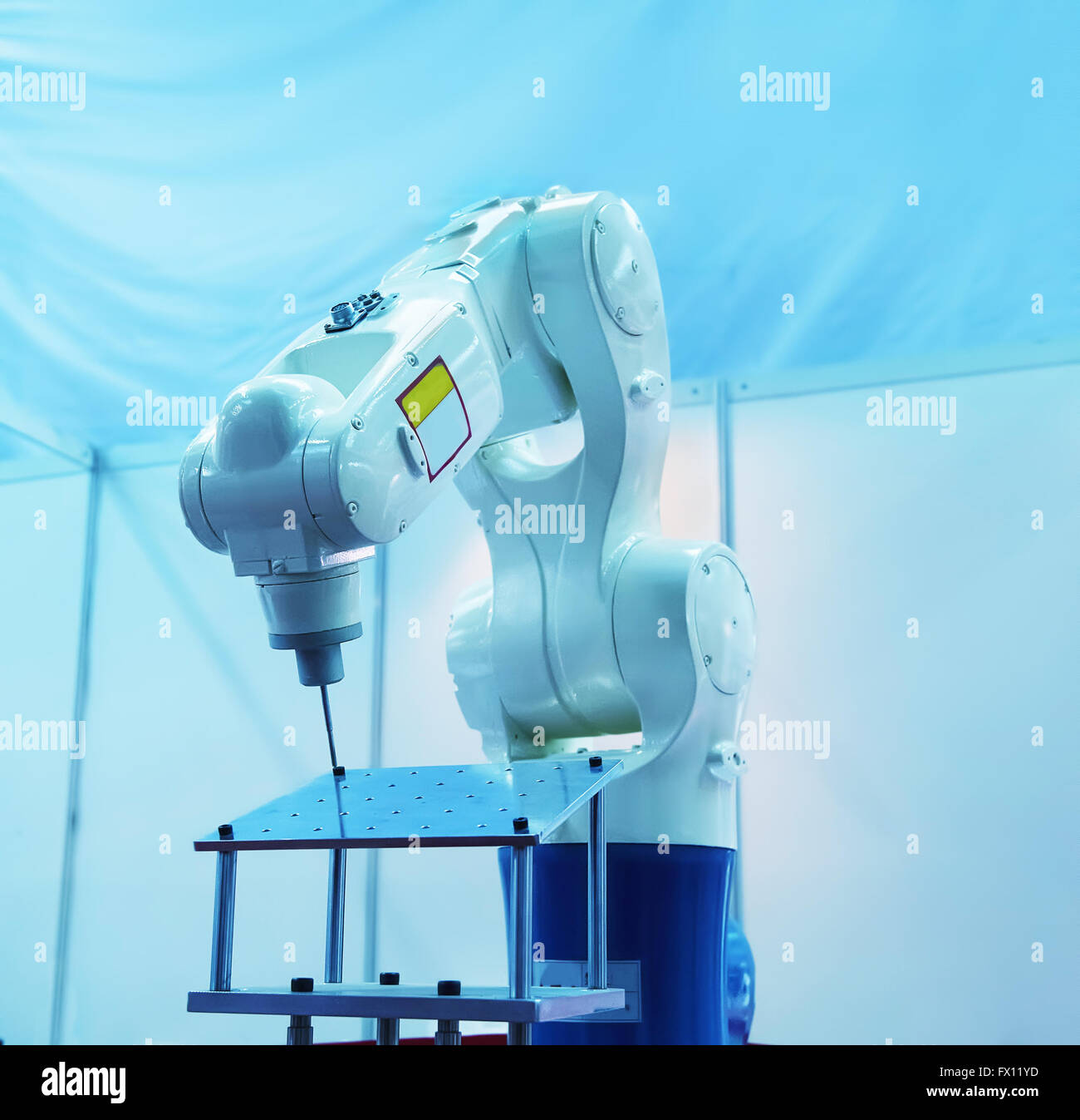 robotic hand machine tool at industrial manufacture factory Stock Photo ...