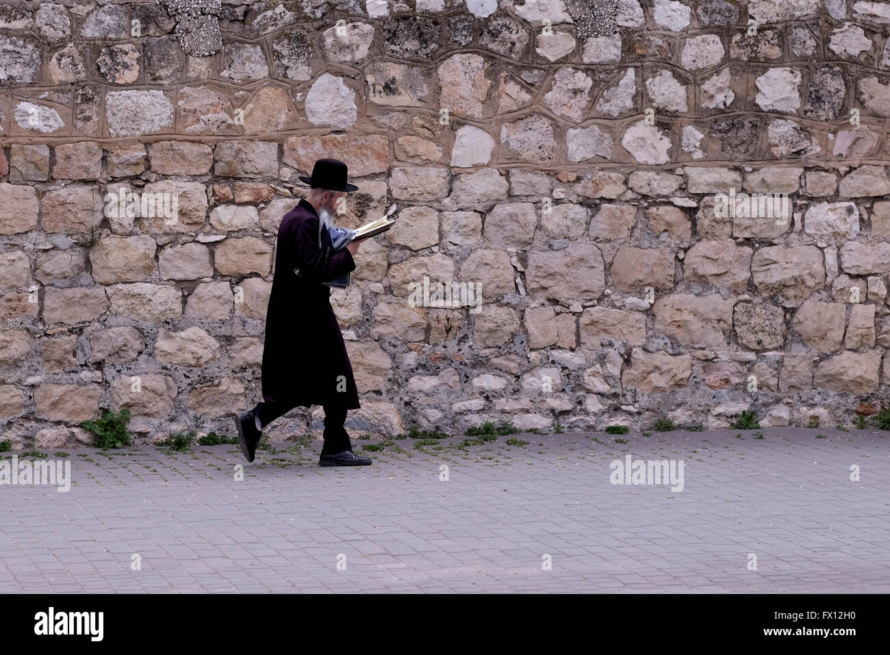 An Ultra orthodox Jew walking in the street on Shabbat at the German ...